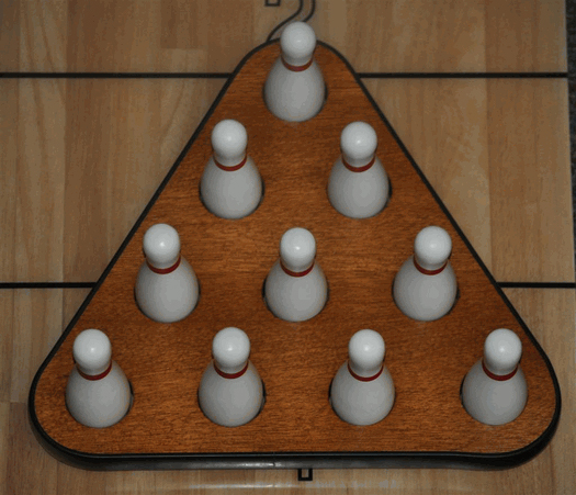 Set of 10 solid wood bowling pins w/ score pad